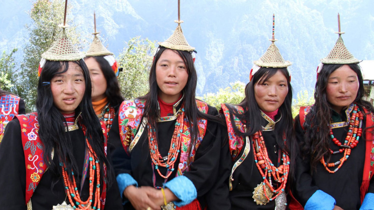 Women from Laya in their unique costume during the highland festival ...